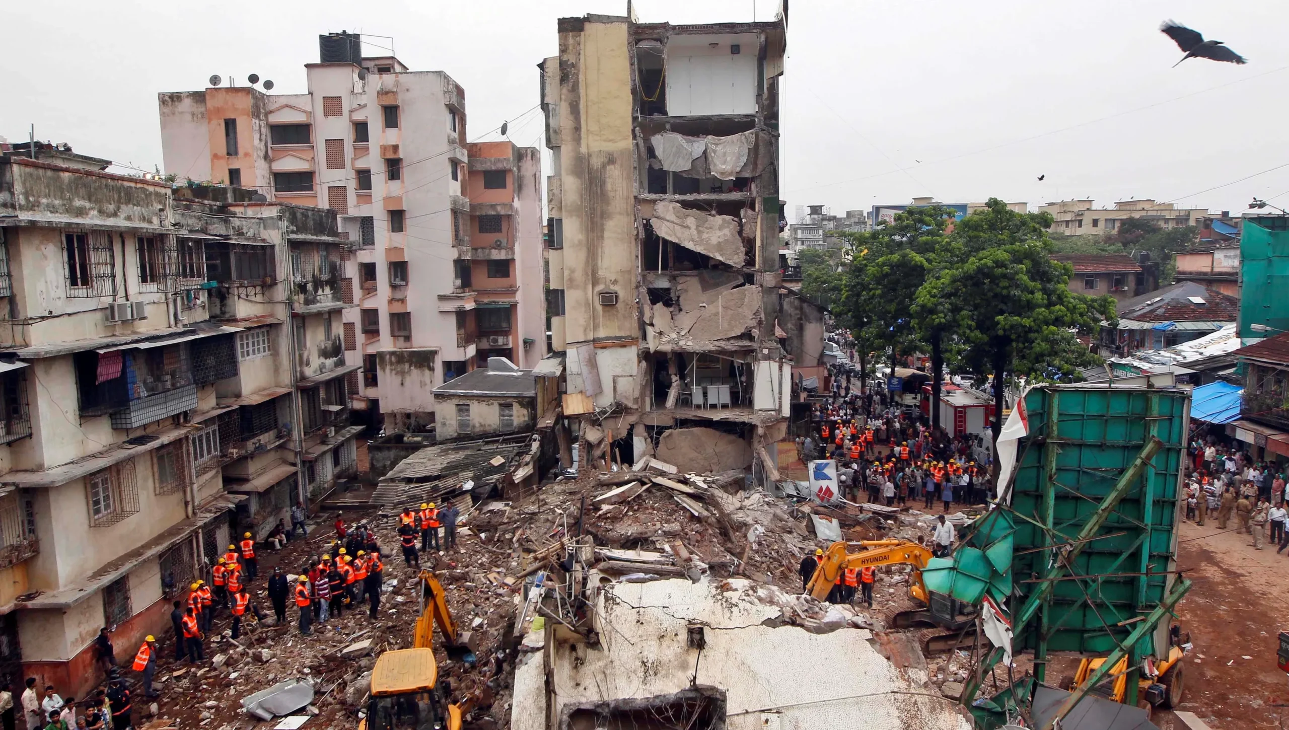 At least 11 die after residential building collapses in Delhi
